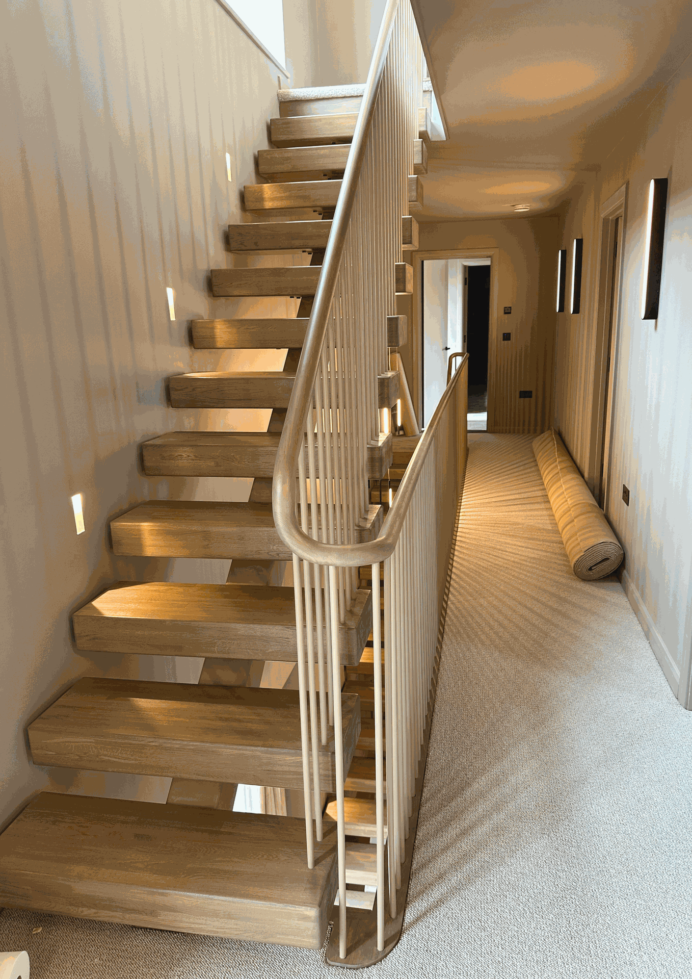 Central Spine Staircase Design with Continuous Handrail | OVOMS UK