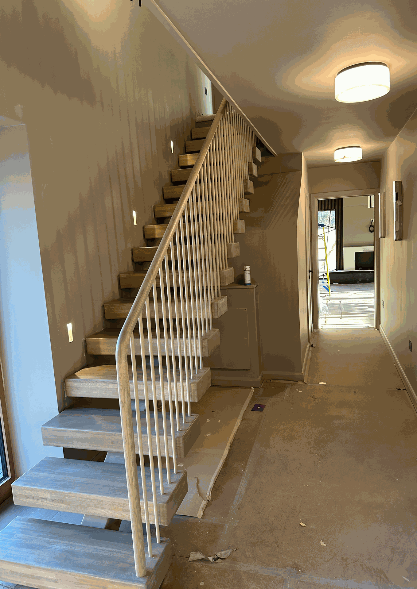 Central Spine Staircase Design with Continuous Handrail | OVOMS UK